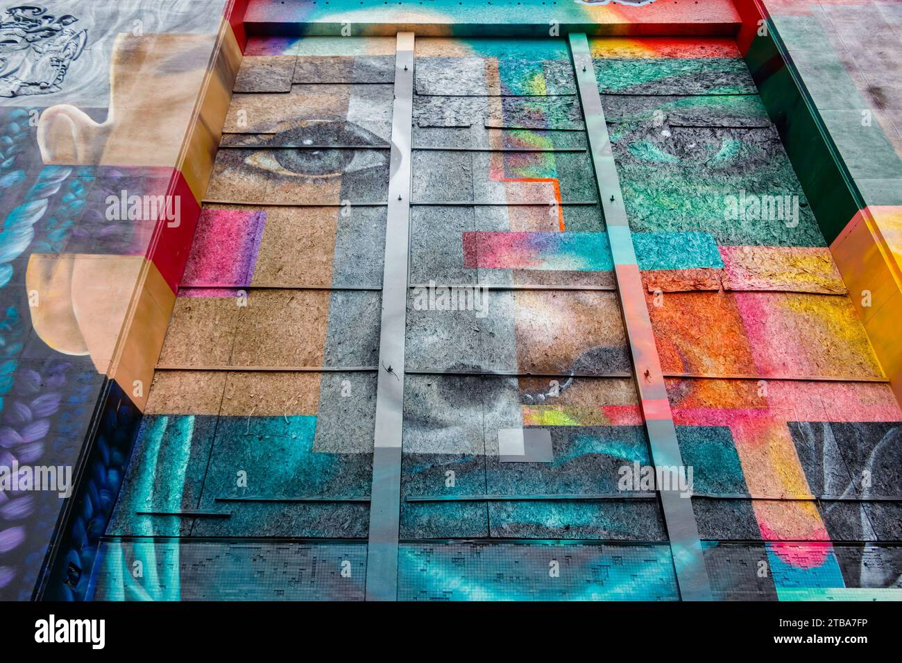 colourful wall painting mural with the word woman on former Norwich ...