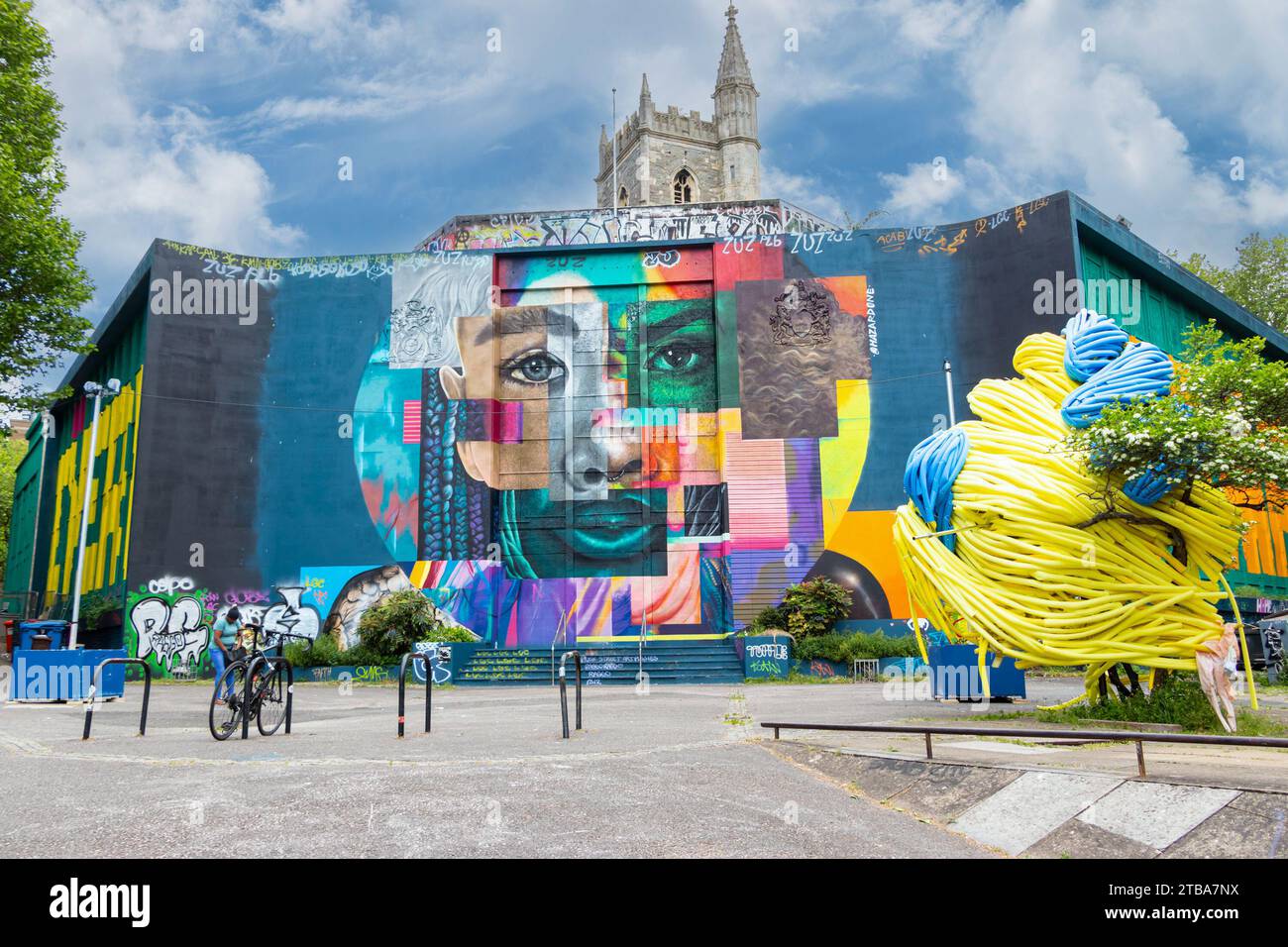 colourful wall painting mural with the word woman on former Norwich ...