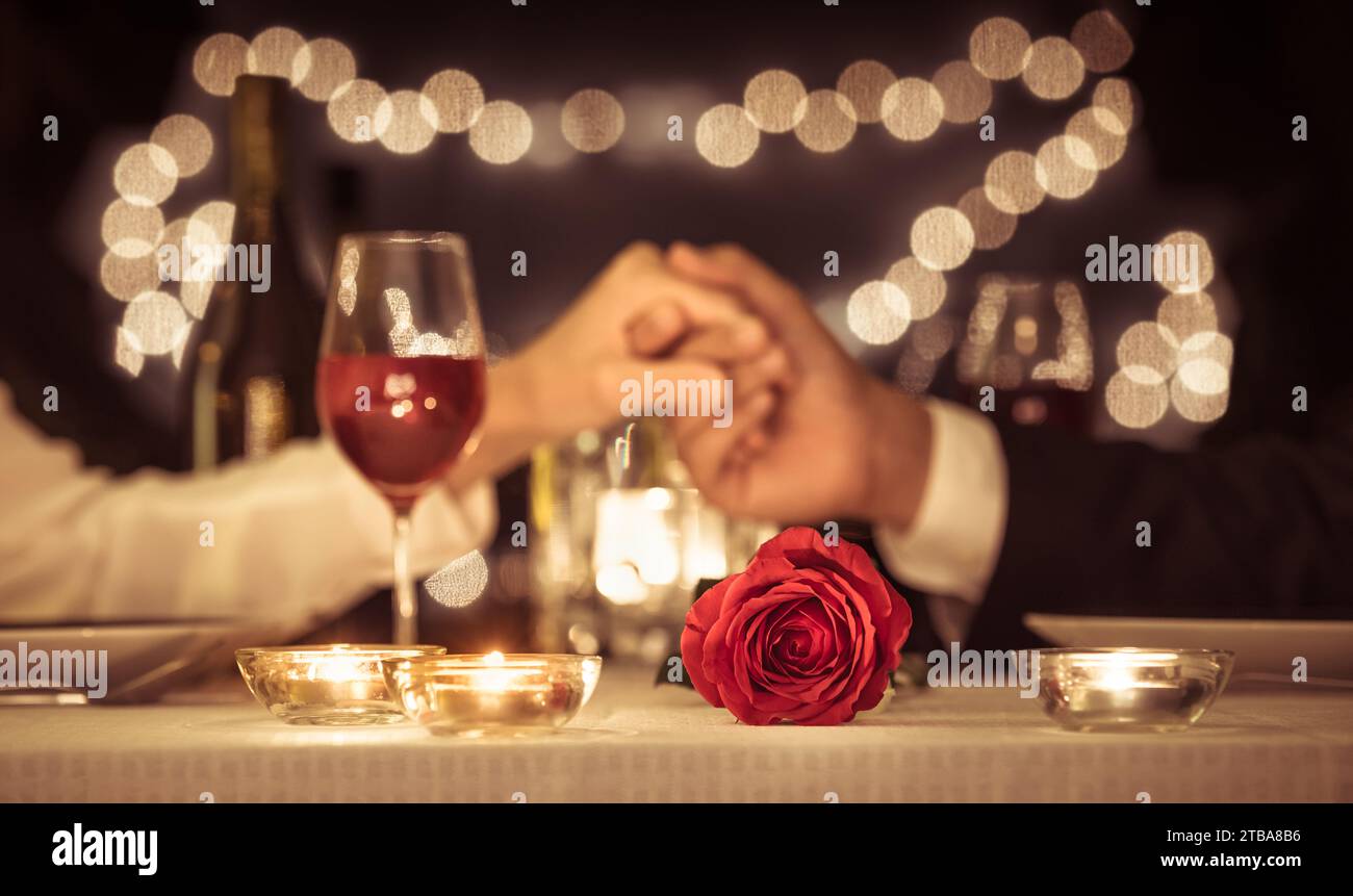 Date night. Man and woman holding hands. Love and dating concept. Focus ...