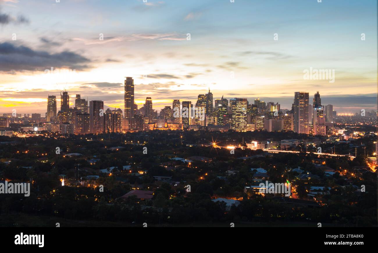 Beautiful city skyline of Manila, Philippines at sunset Stock Photo - Alamy