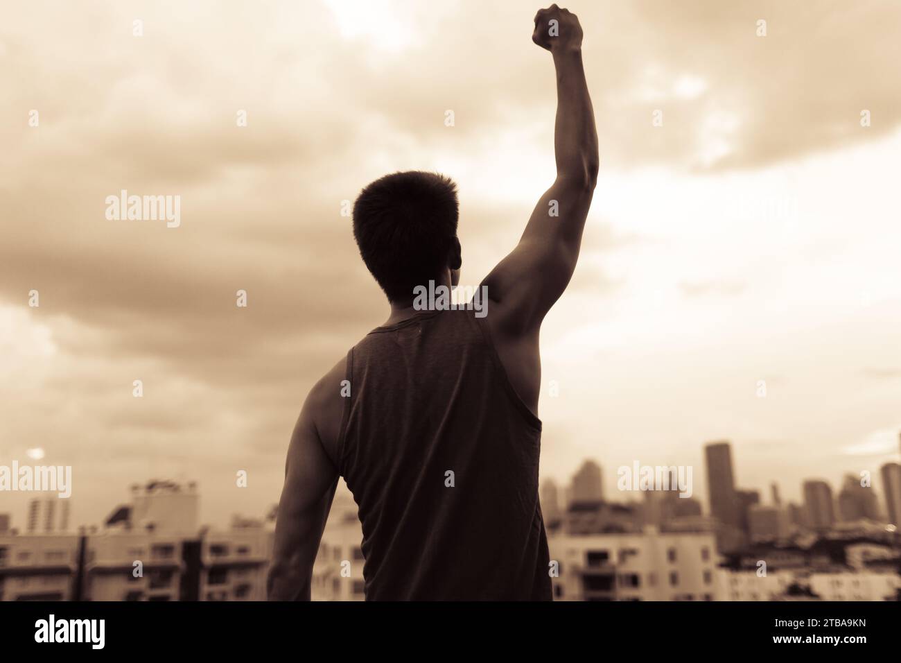strong motivated inspired man facing the city Stock Photo - Alamy