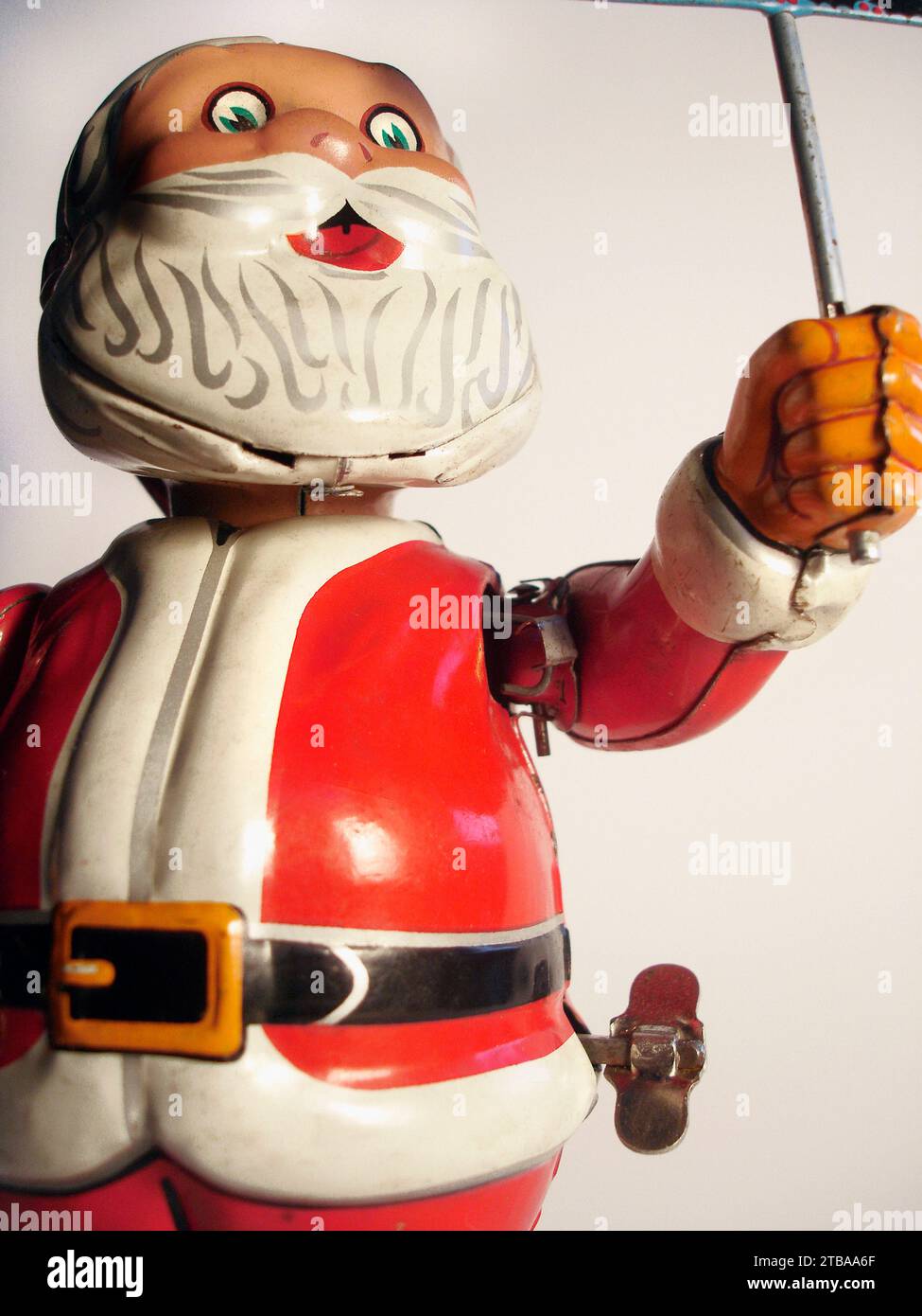 Close up a vintage Father Christmas tin toy. Full traditional Santa ...