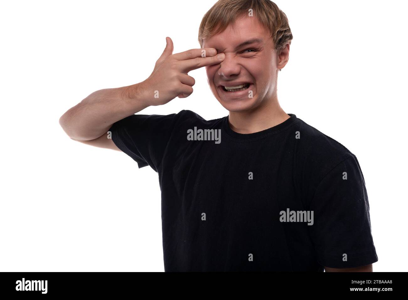 European teenage guy with brown hair smiles while talking Stock Photo ...