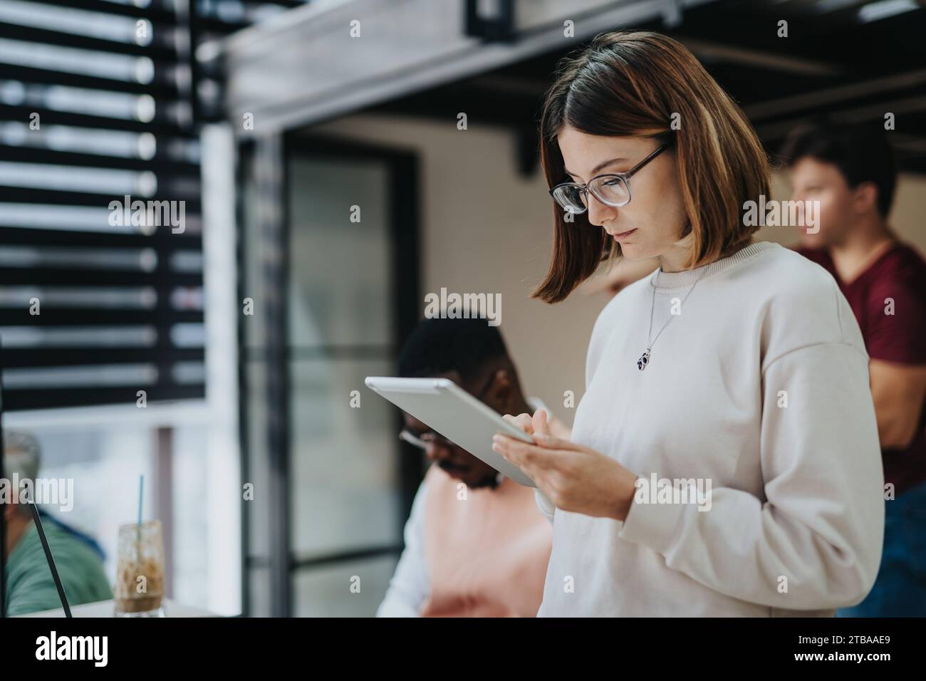 Multiracial Colleagues Collaborating On Strategic Business Development And Market Analysis In