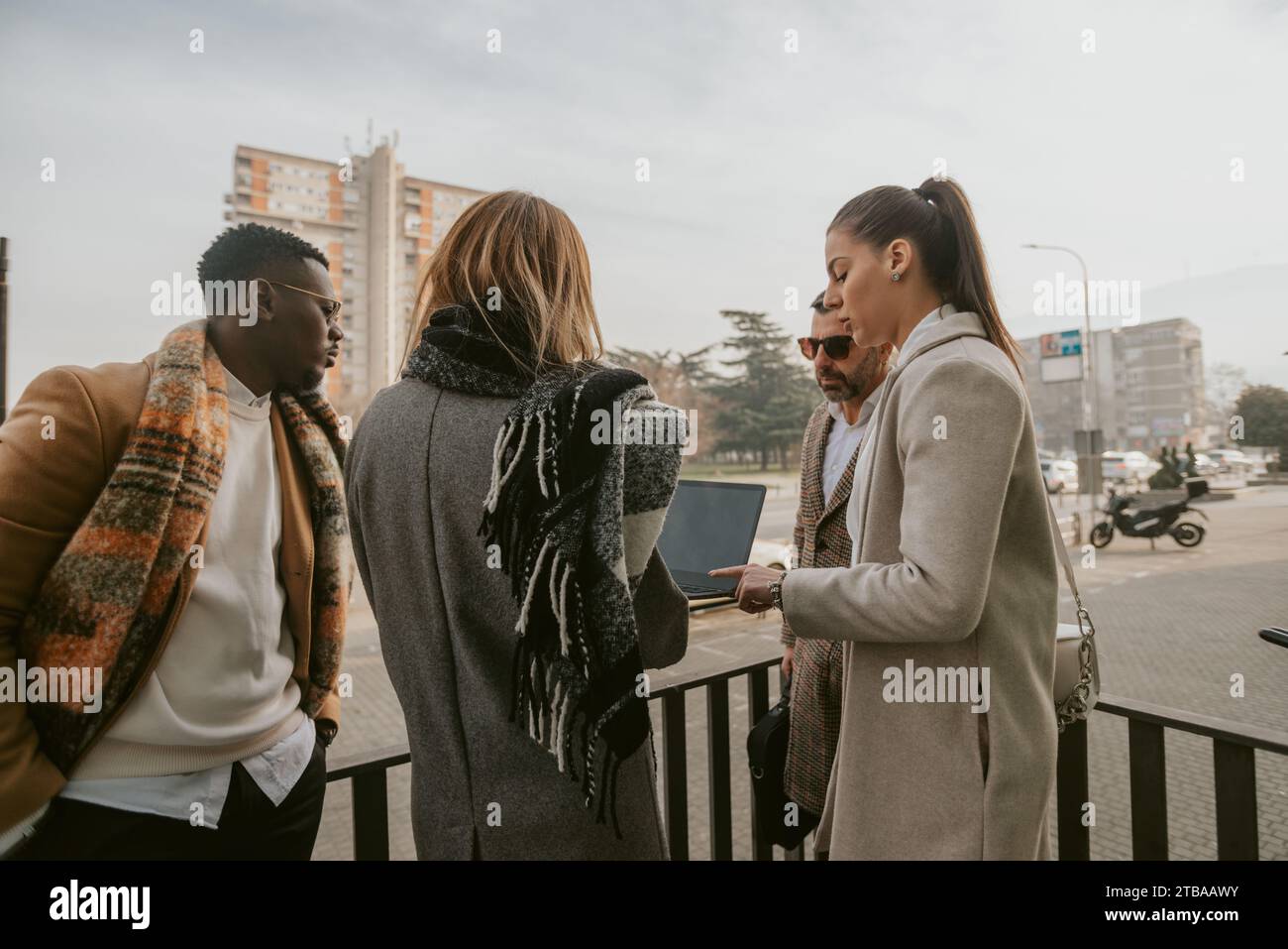 Talking while standing Stock Photo - Alamy