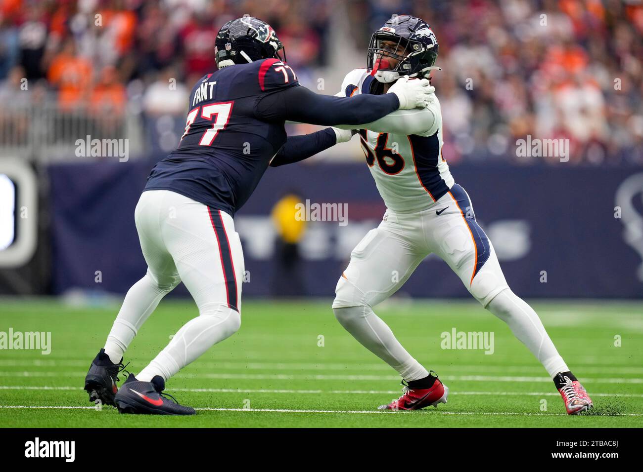 Denver Broncos linebacker Baron Browning (56) is blocked by Houston ...