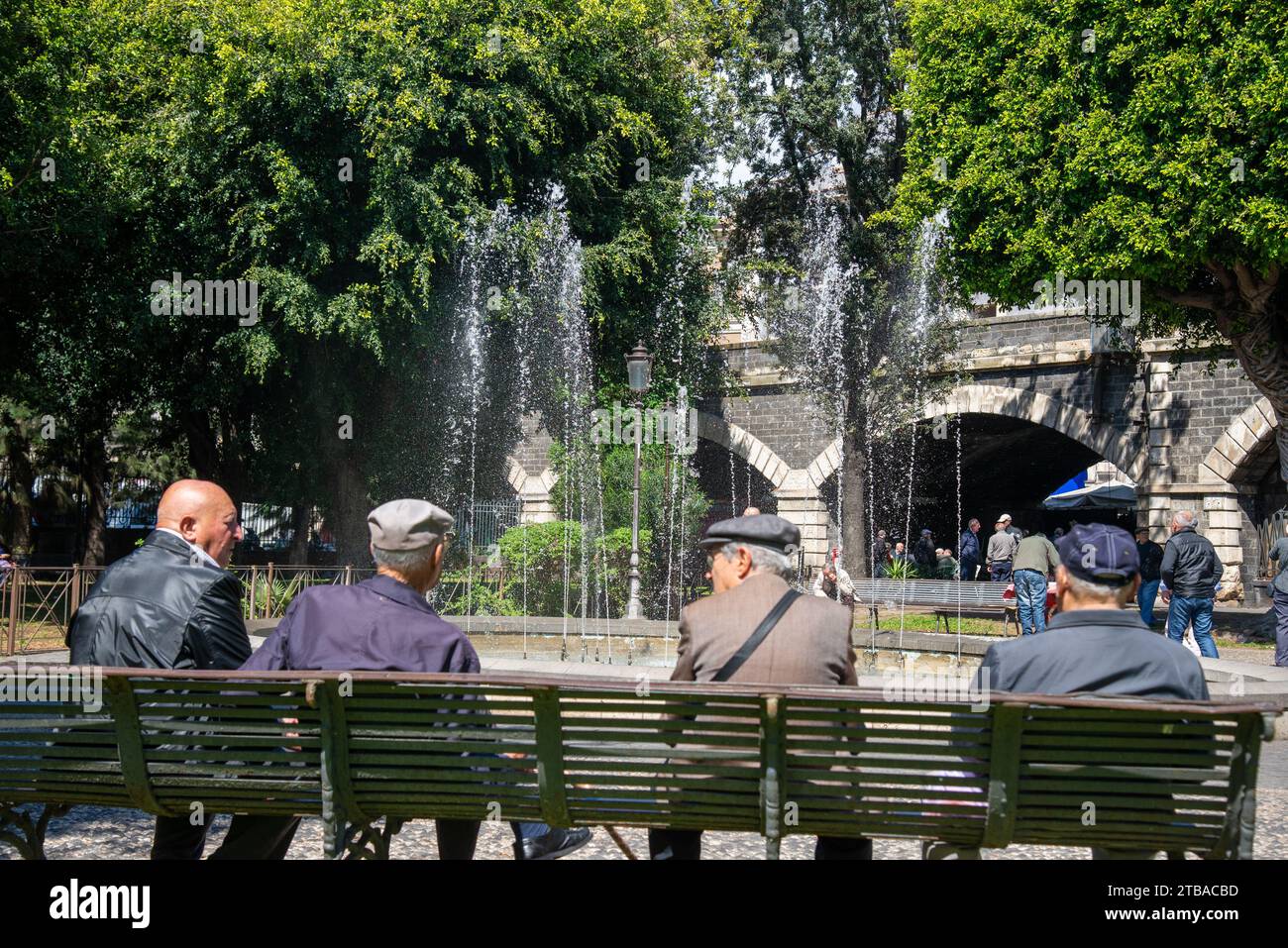 old men at bench in park in Catania, Sicily, Italy Stock Photo - Alamy