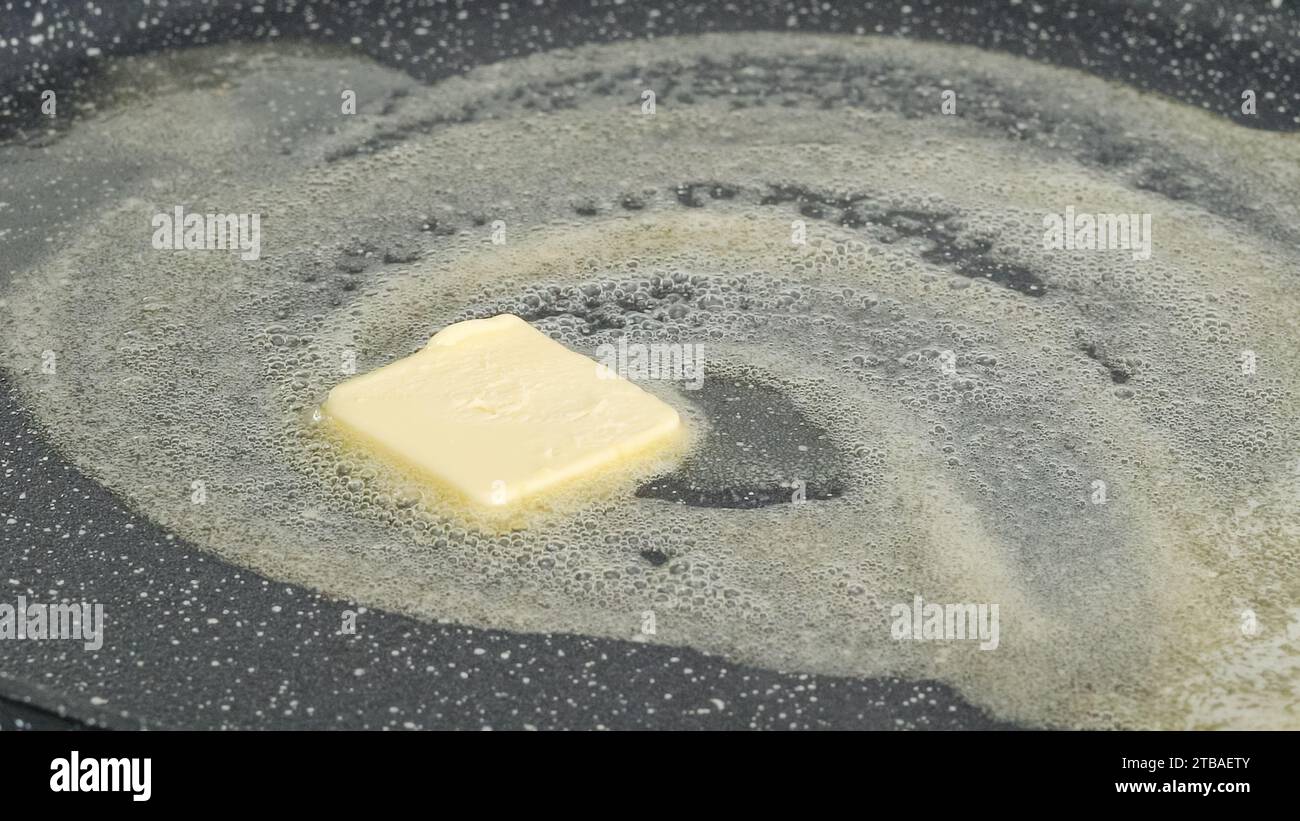 Frying egg butter hi-res stock photography and images - Alamy