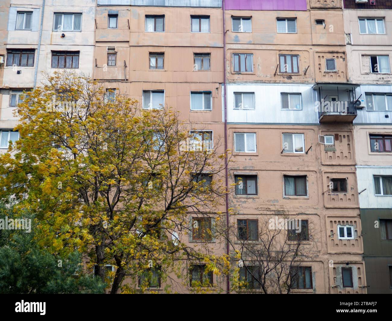 Old nine-story building. High-rise building in Asia. This is how the ...