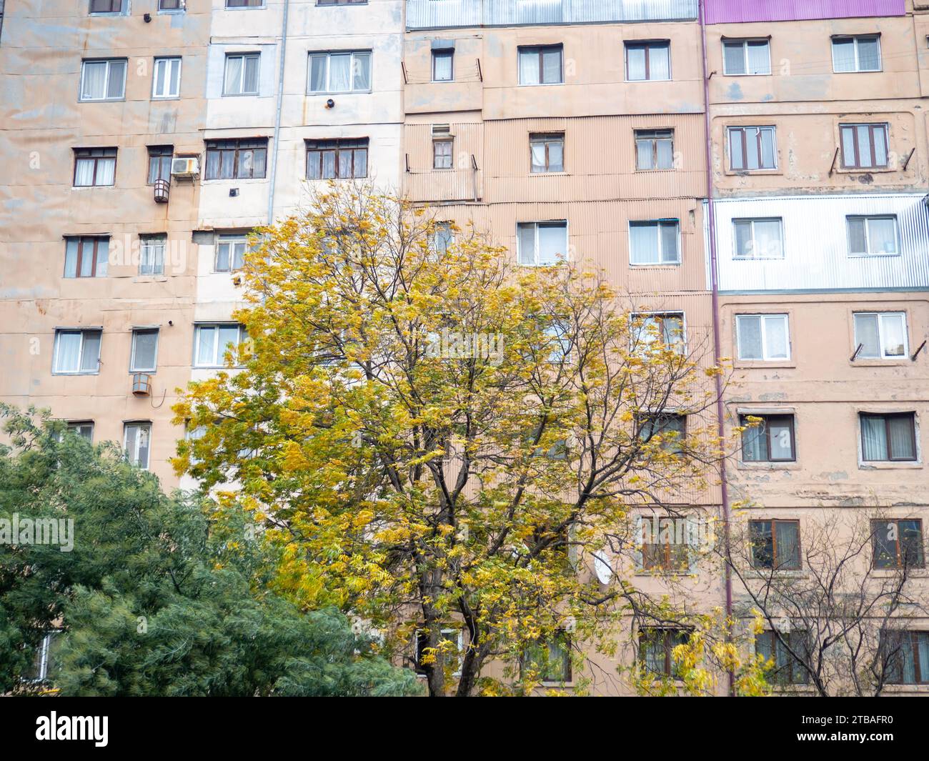 Old nine-story building. High-rise building in Asia. This is how the ...