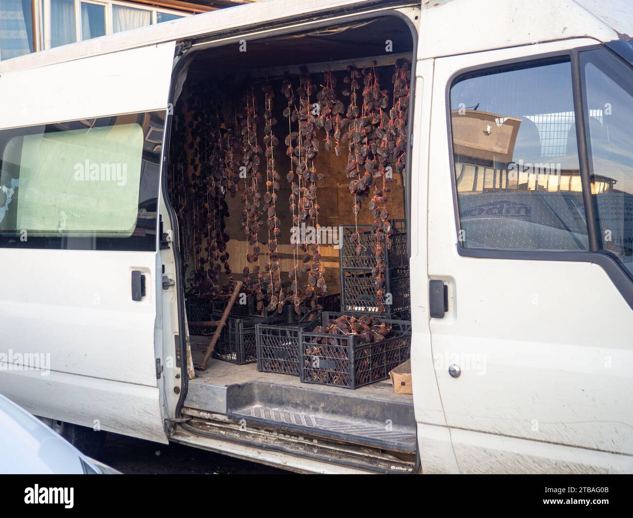 Selling dried persimmons from a car. Dried fruits in the car. The car ...