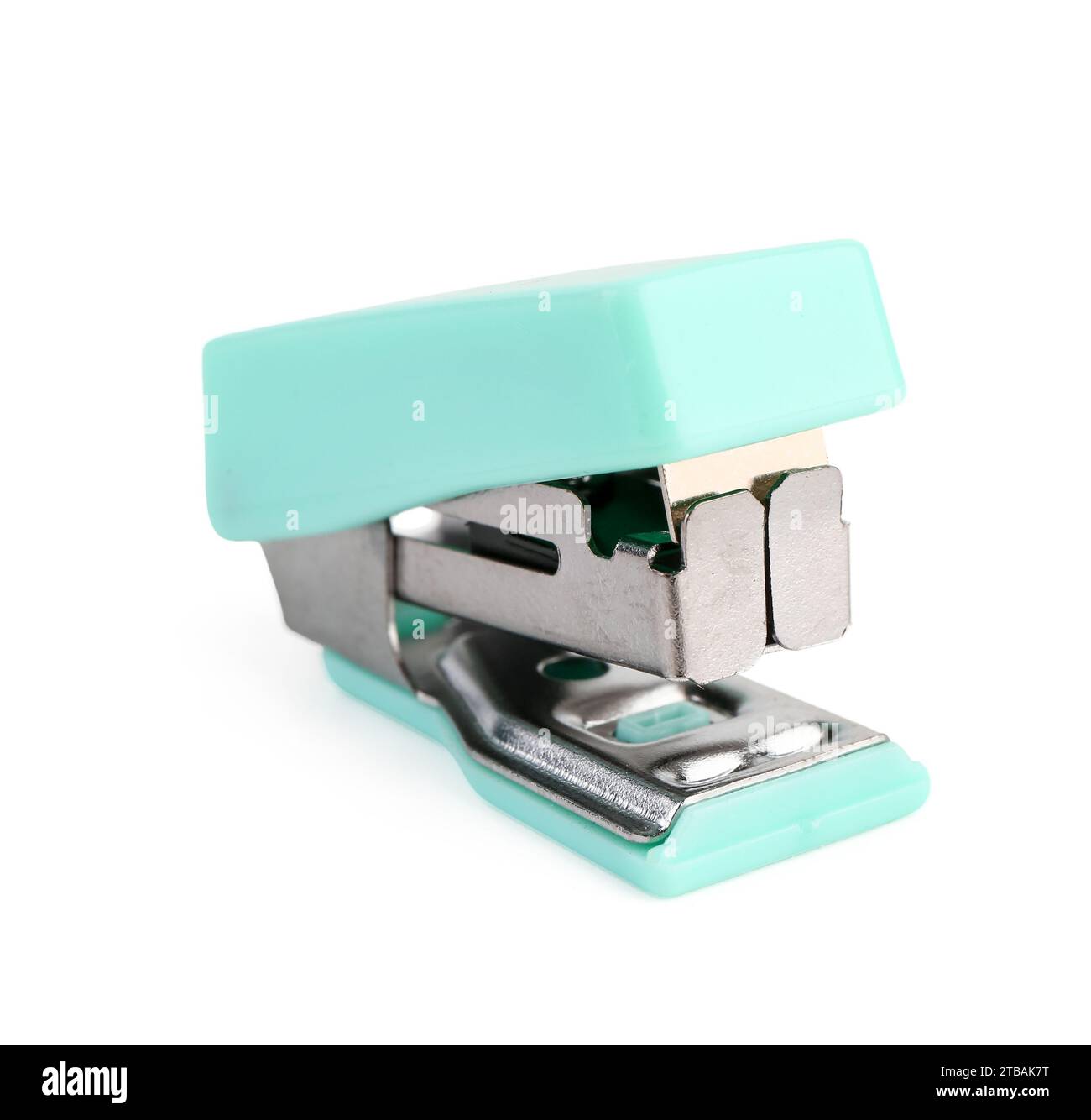 Green stapler isolated on white background Stock Photo - Alamy