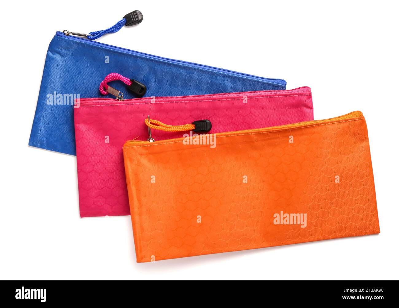 Colorful pencil cases on white background Stock Photo - Alamy