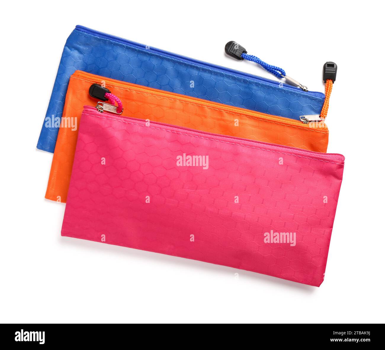 Colorful pencil cases on white background Stock Photo - Alamy