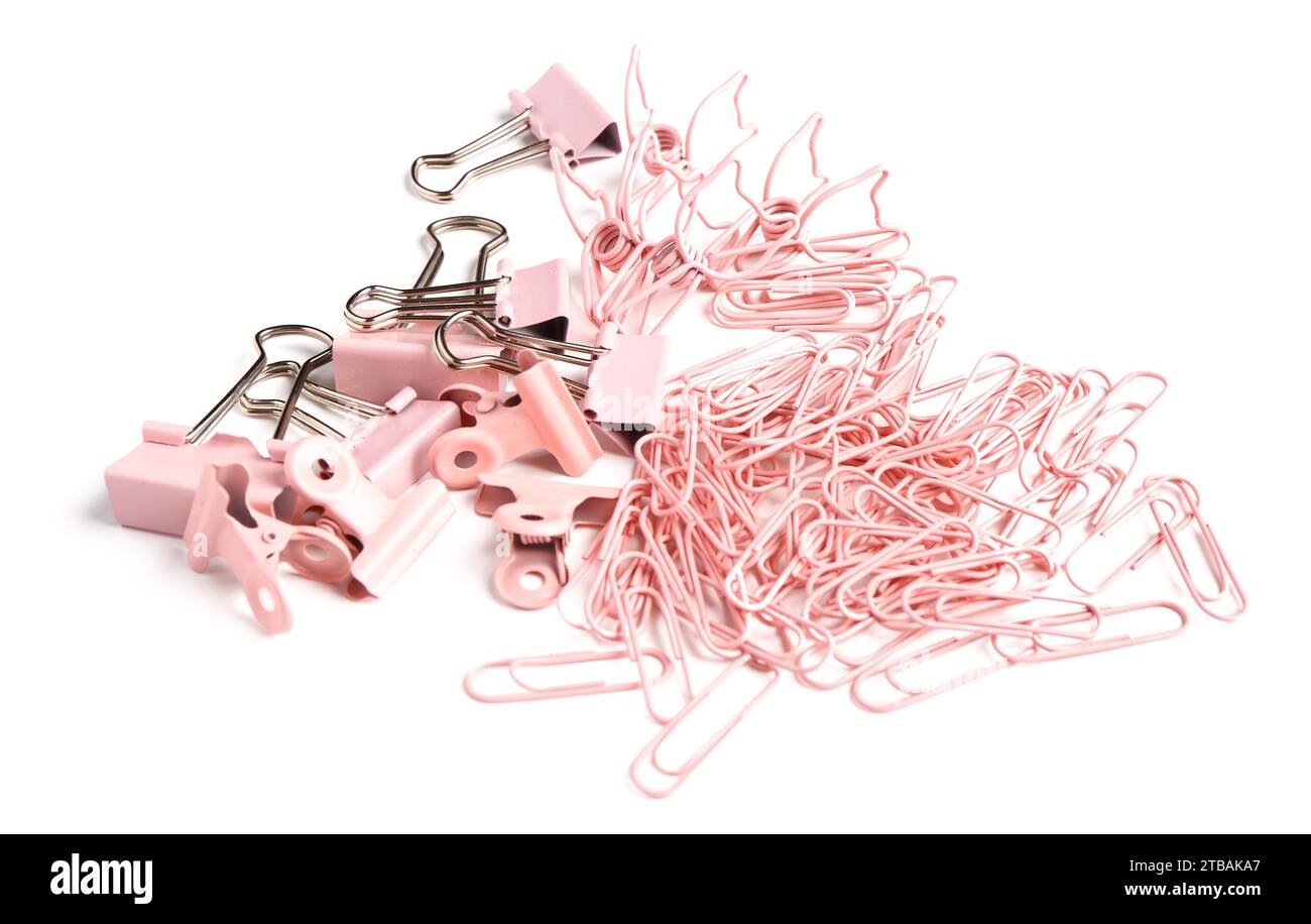 Set of pink paper clips, binders and pins on white background Stock ...