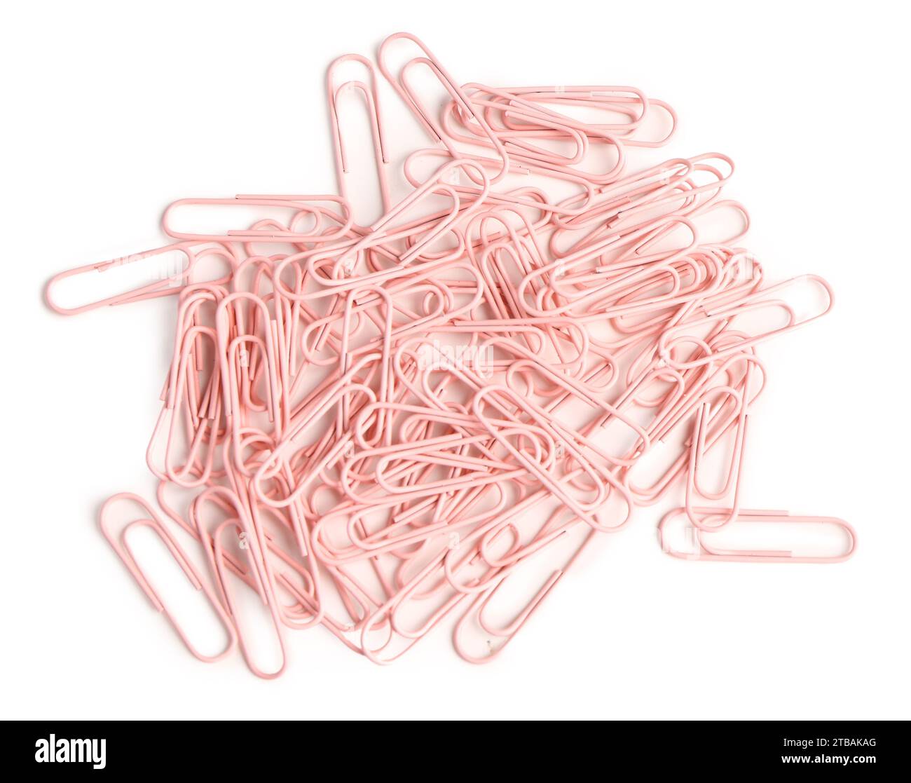 Pink paper clips on white background Stock Photo - Alamy