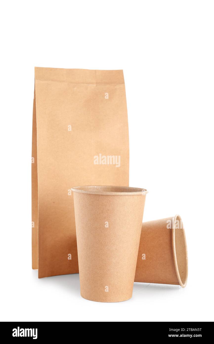 Takeaway paper cups and bag on white background Stock Photo - Alamy