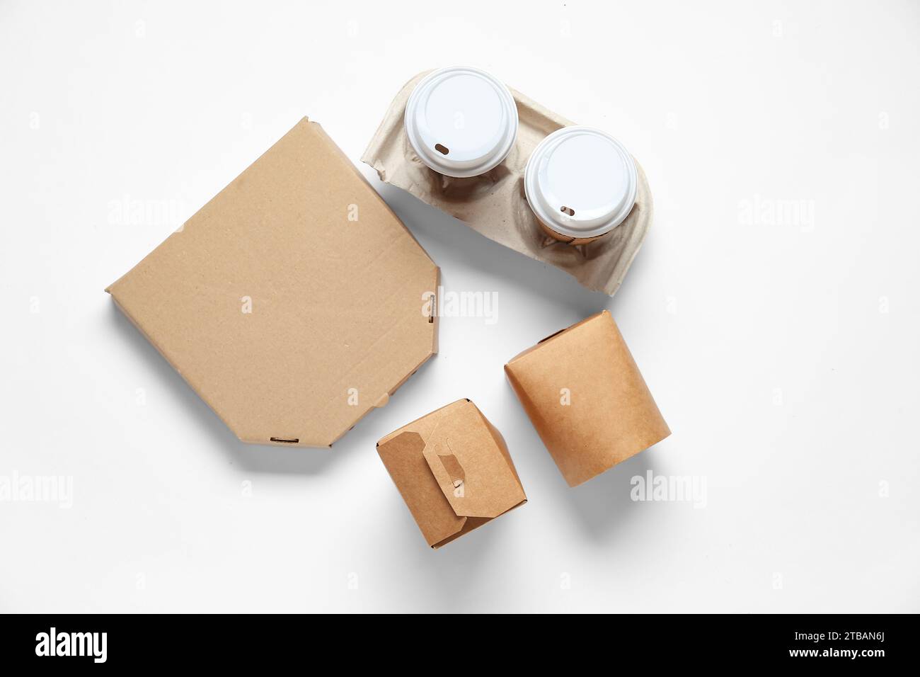 Takeaway paper cups and boxes on white background Stock Photo - Alamy