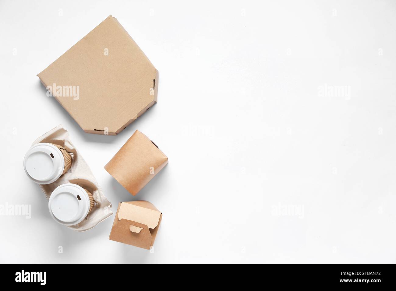 Takeaway paper cups and boxes on white background Stock Photo - Alamy