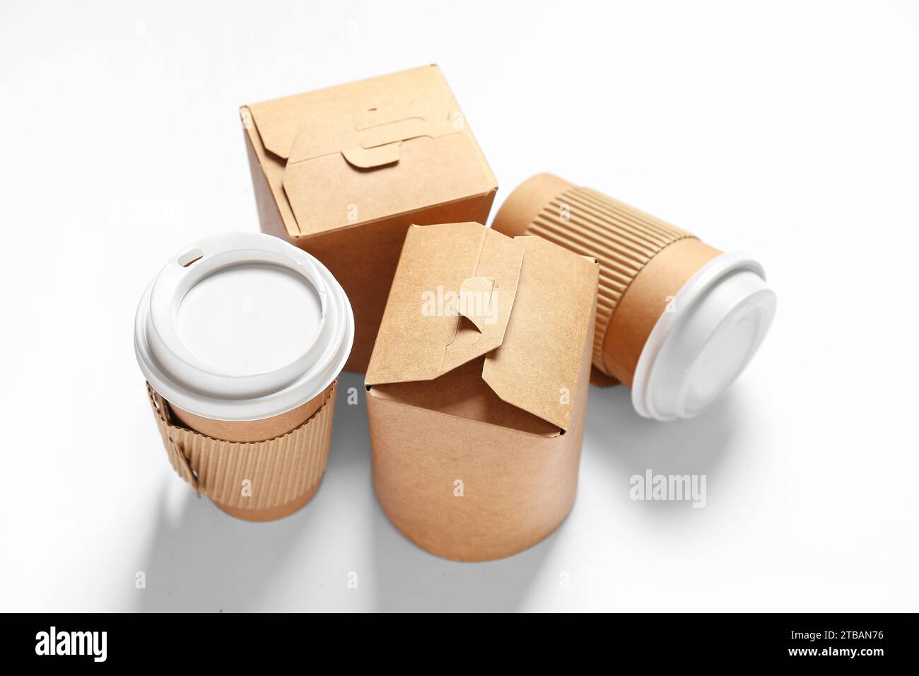 Takeaway paper cups and boxes on white background Stock Photo - Alamy