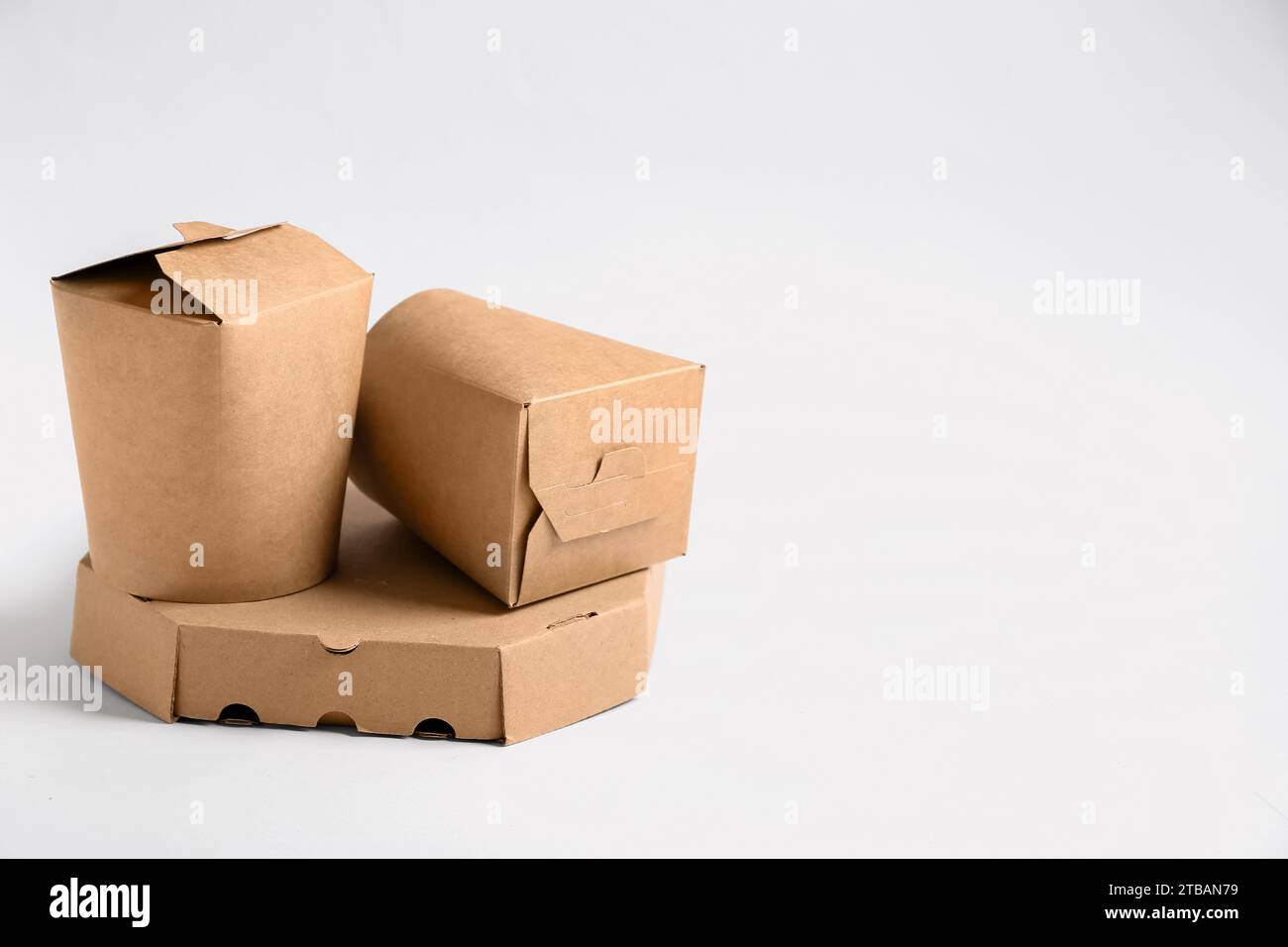 Different takeaway paper boxes on white background Stock Photo - Alamy