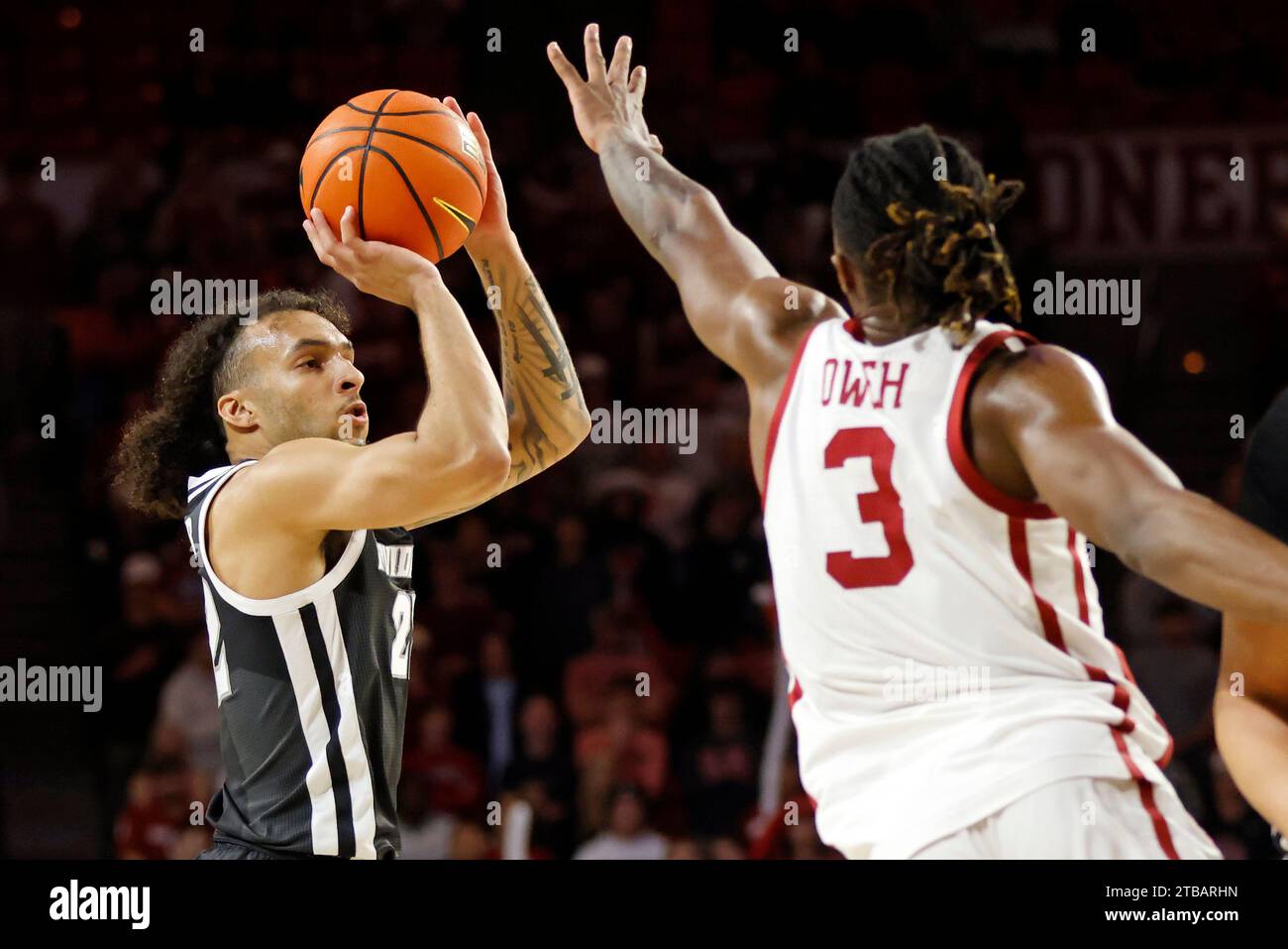 Providence guard Devin Carter, left, shoots against Oklahoma guard ...