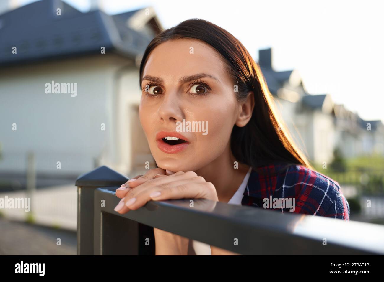 Spying on neighbours hi-res stock photography and images - Alamy