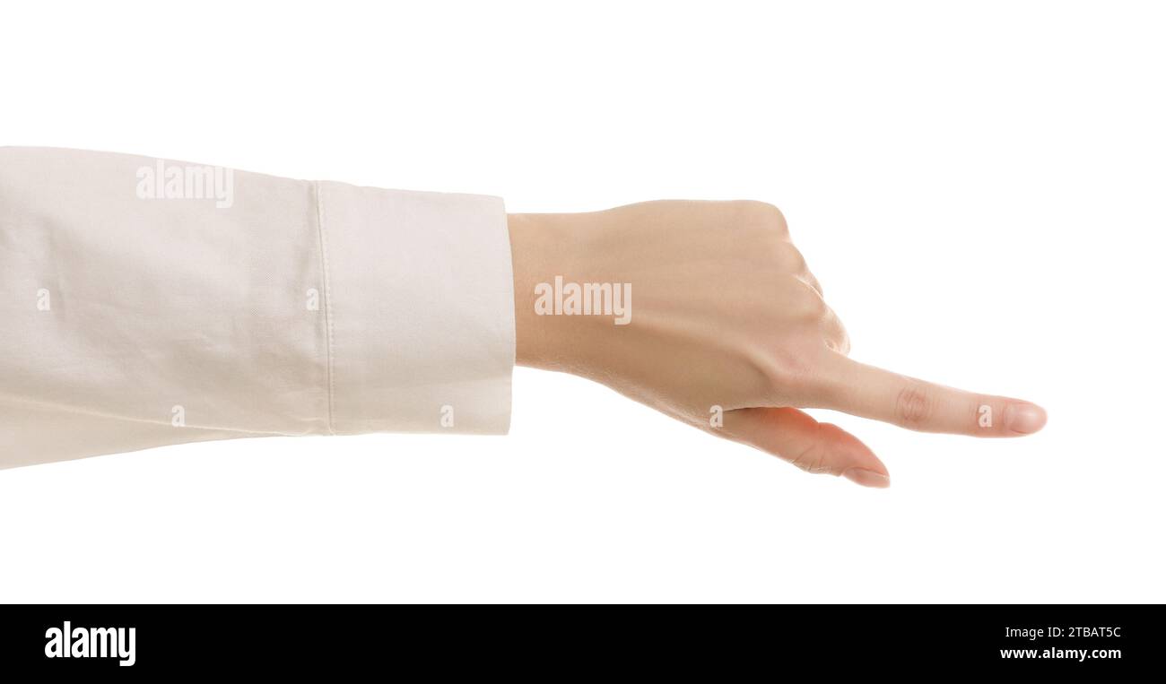 Woman pointing with index finger on white background, closeup ...