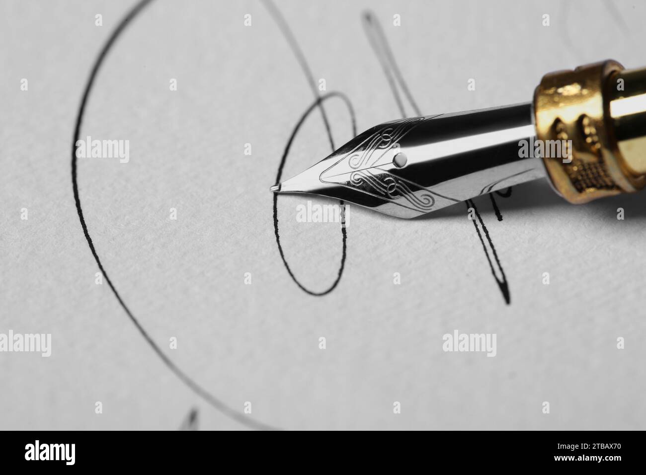 Signing on sheet of paper with fountain pen, closeup Stock Photo - Alamy