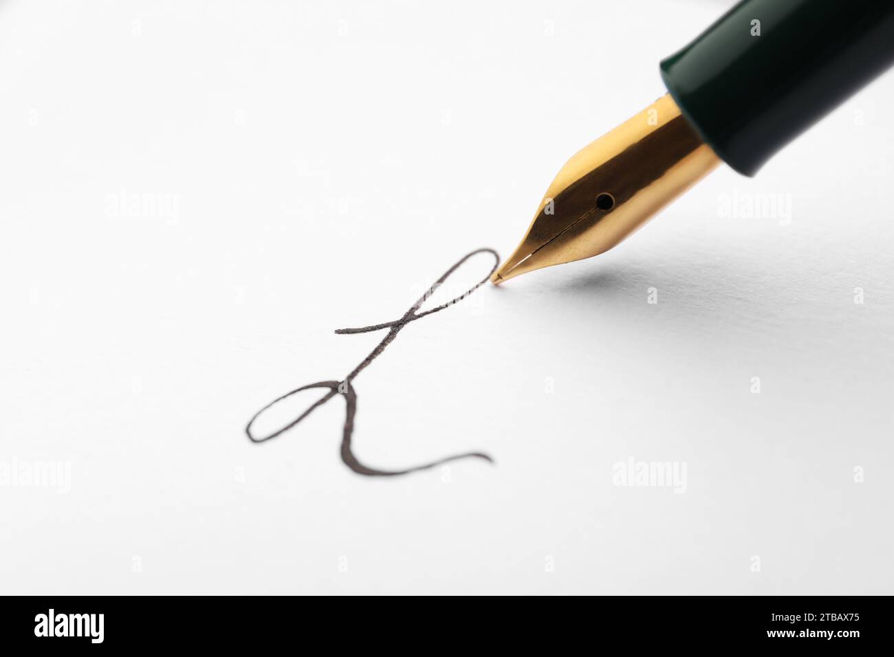 Signing on sheet of paper with fountain pen, closeup Stock Photo - Alamy