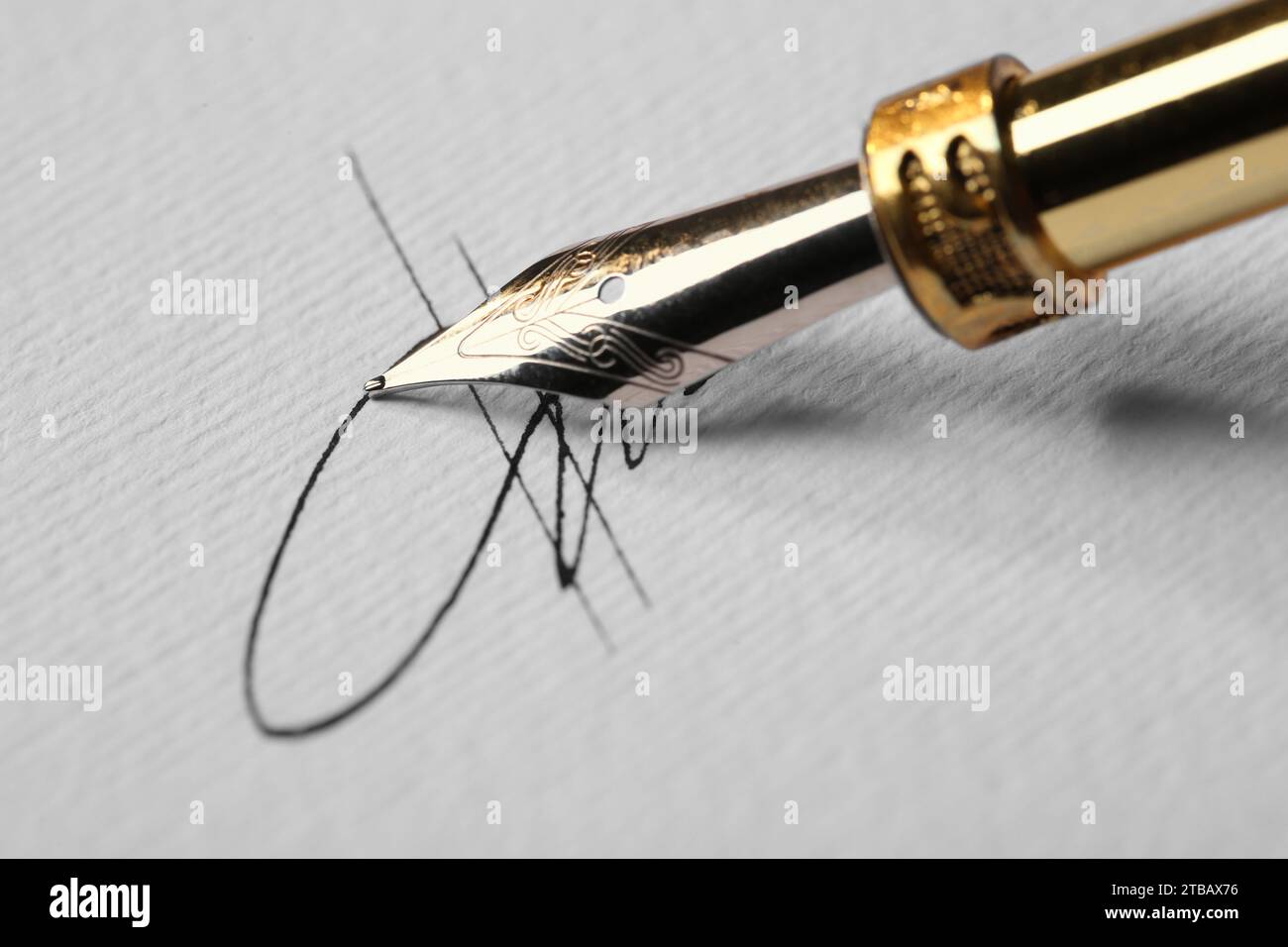 Signing on sheet of paper with fountain pen, closeup Stock Photo - Alamy