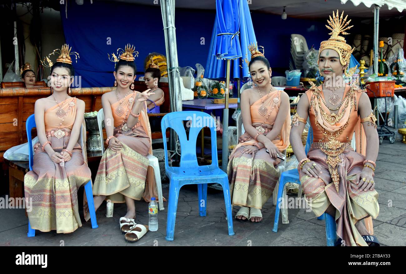Traditional Isaan morlam dancers in elaborate costumes wait to perform ...