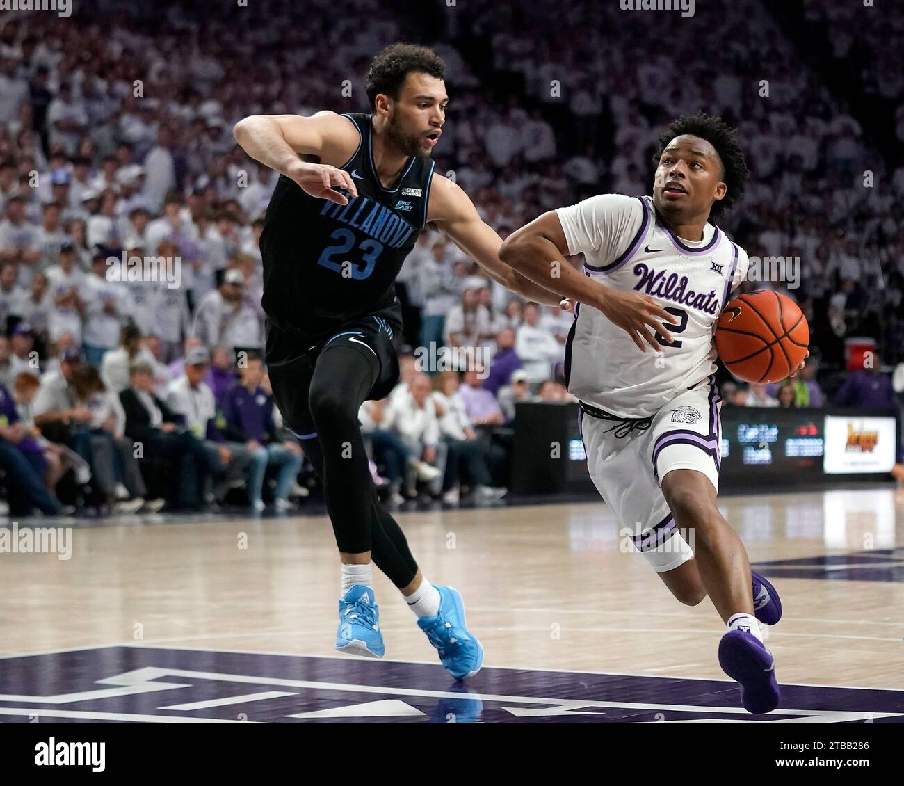 Kansas State guard Tylor Perry (2) drives under pressure from Villanova ...
