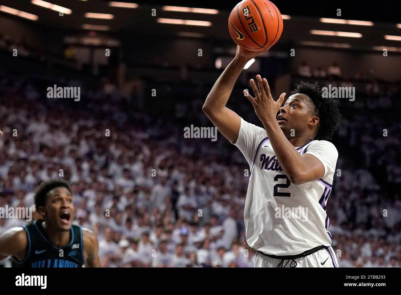 Kansas State guard Tylor Perry shoots during overtime of an NCAA ...