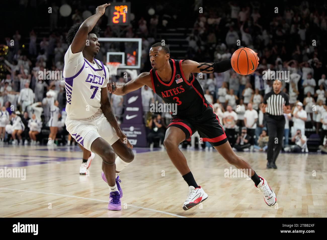 San Diego State guard Micah Parrish (3) drives on Grand Canyon guard Tyon Grant-Foster during ...