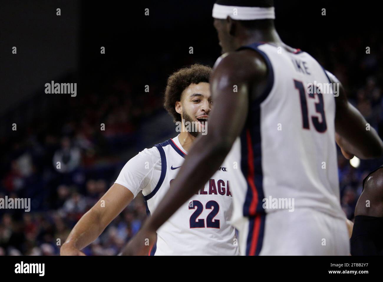 Gonzaga forward Graham Ike (13) celebrates his basket with Anton Watson ...