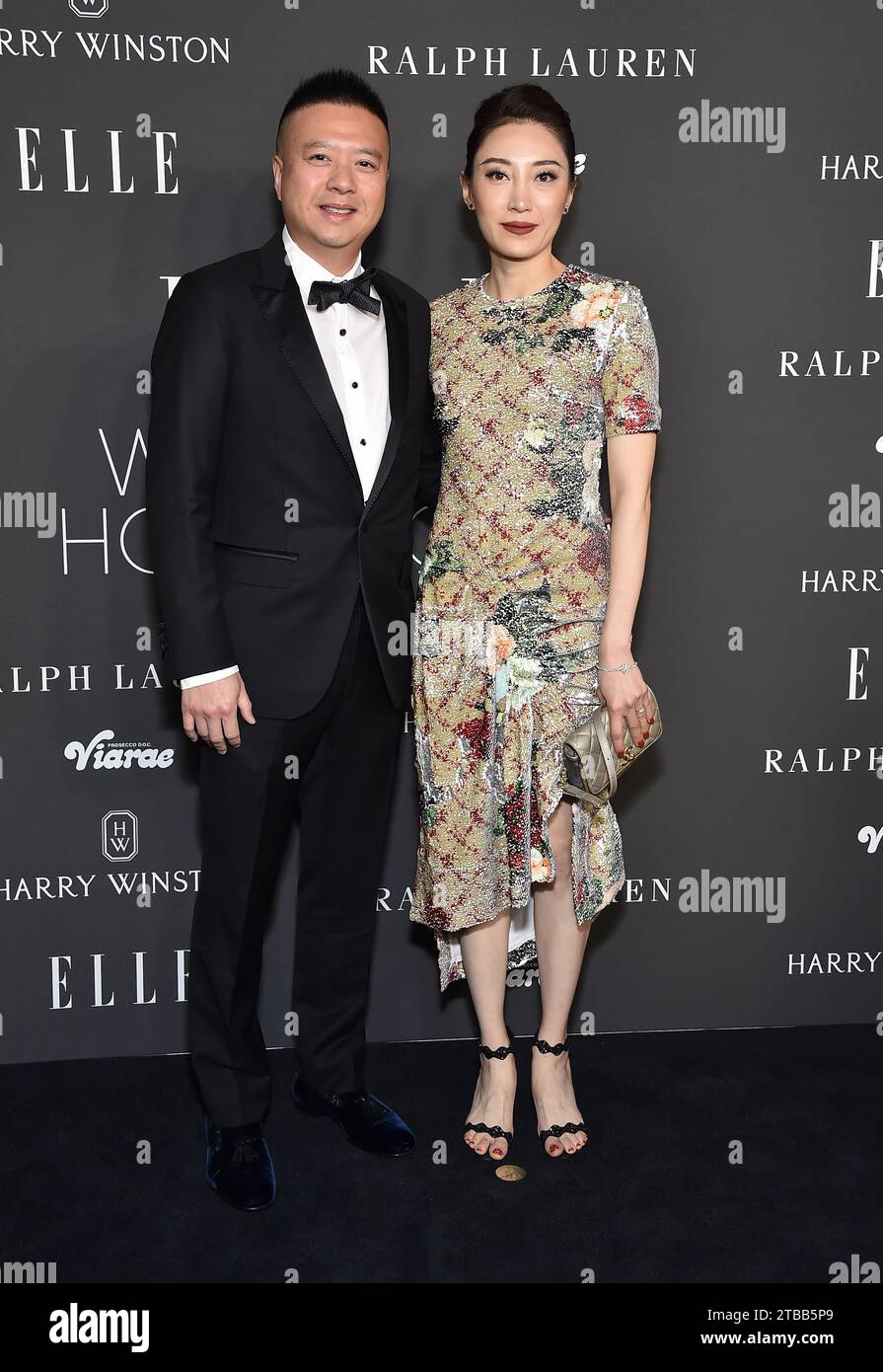 Hollywood, USA. 05th Dec, 2023. John Rong and Christina Rong arriving ...