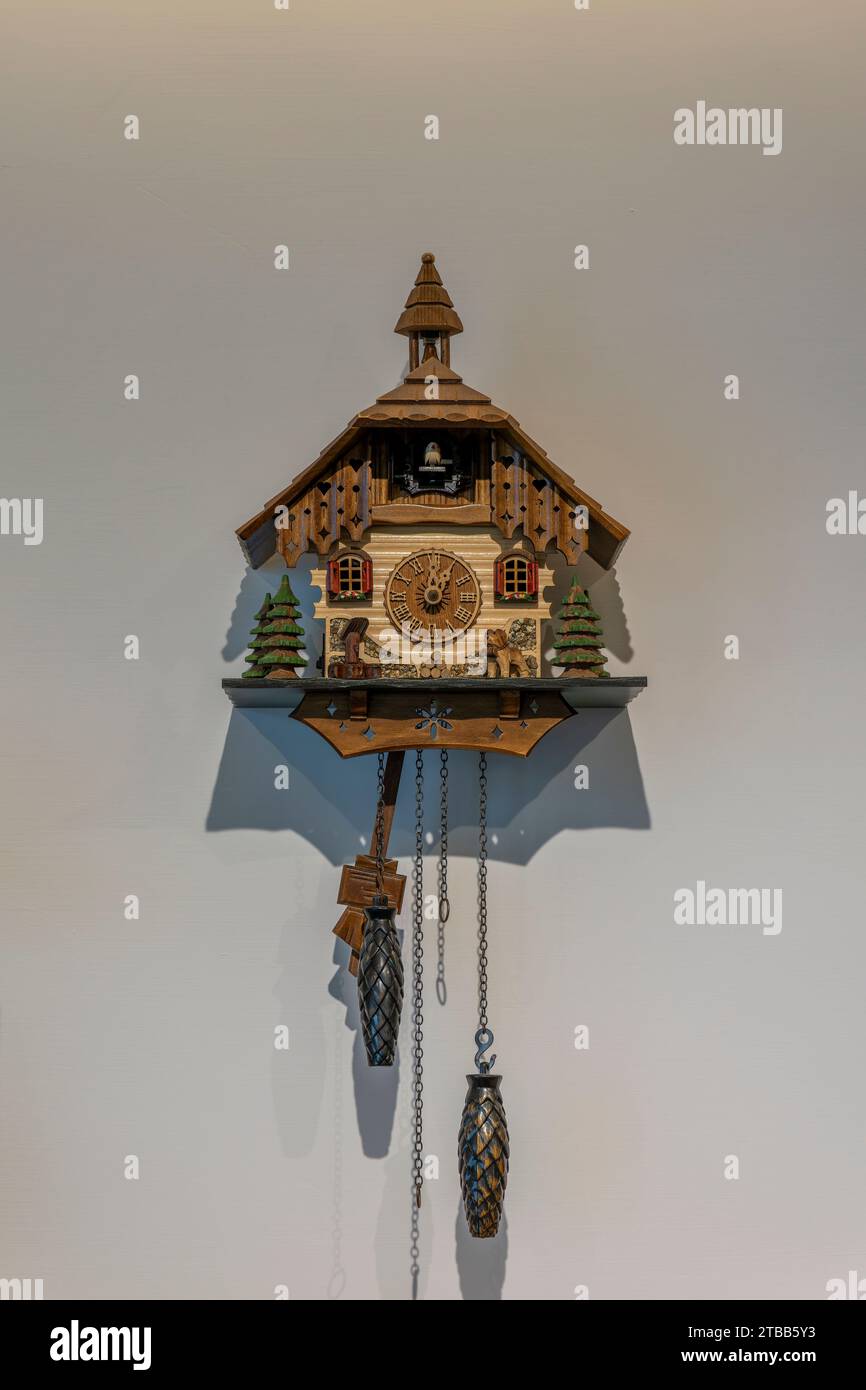 Cuckoo clock on the wall Stock Photo - Alamy