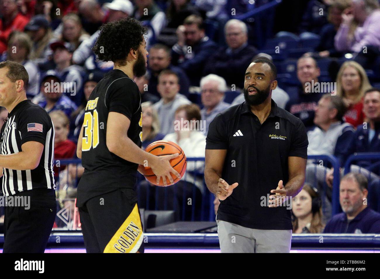 Arkansas-Pine Bluff head coach Solomon Bozeman, right, speaks with ...