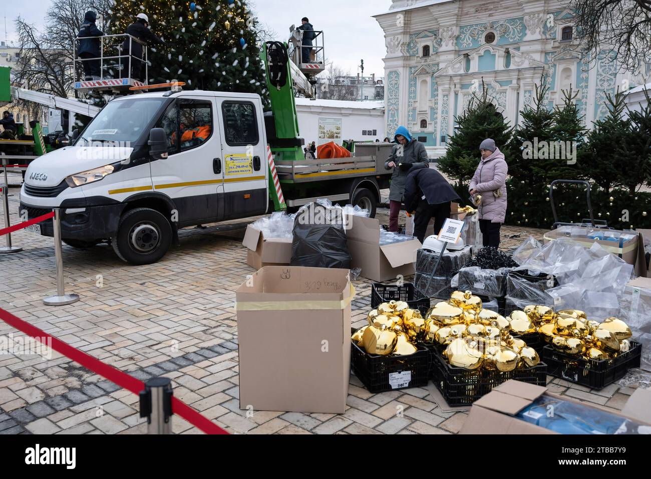 Municipal workers install a Christmas tree at Sophia Square in central ...