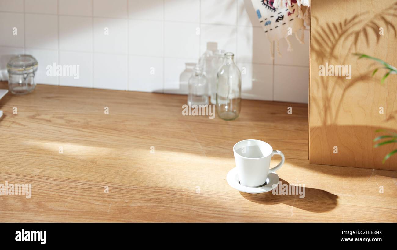 A sunny kitchen with white tile walls, a wooden table and sink Stock ...