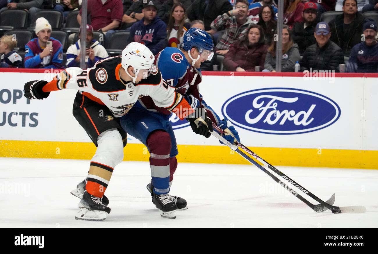 Anaheim Ducks defenseman Ilya Lyubushkin, left, ties up Colorado ...