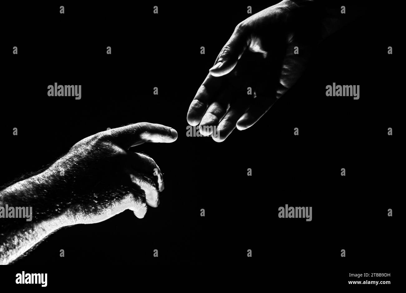 Men holding hands isolated on black. Connection and human relations ...