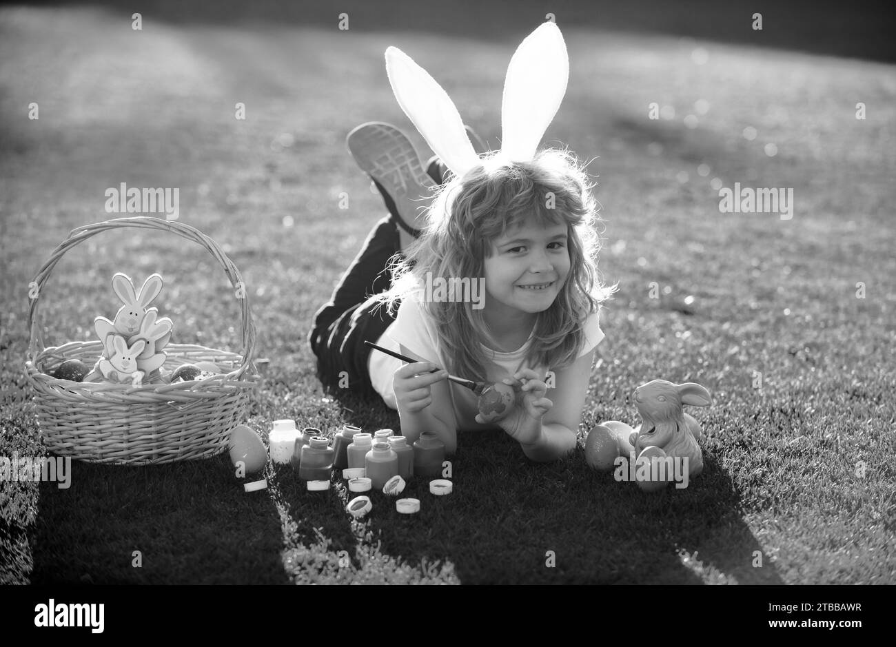 Children celebrating easter. Kid in rabbit costume with bunny ears ...