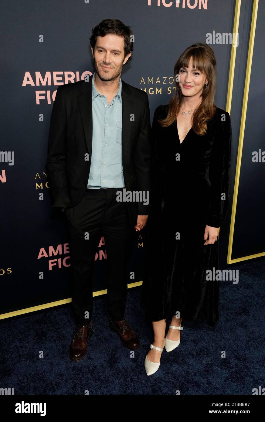 Adam Brody, left, a cast member in "American Fiction," poses with his ...