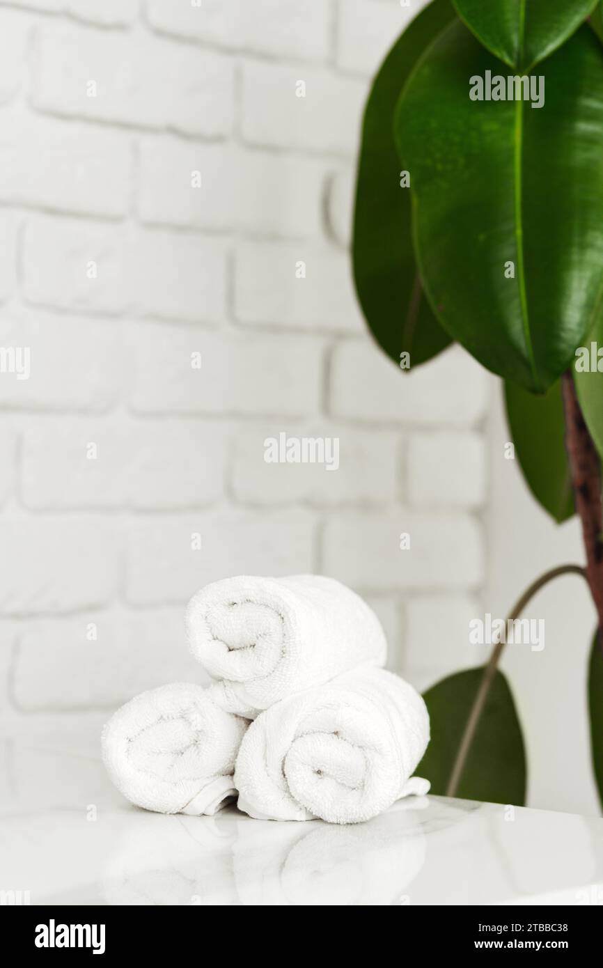 Stack of white towels in the bathroom Stock Photo - Alamy