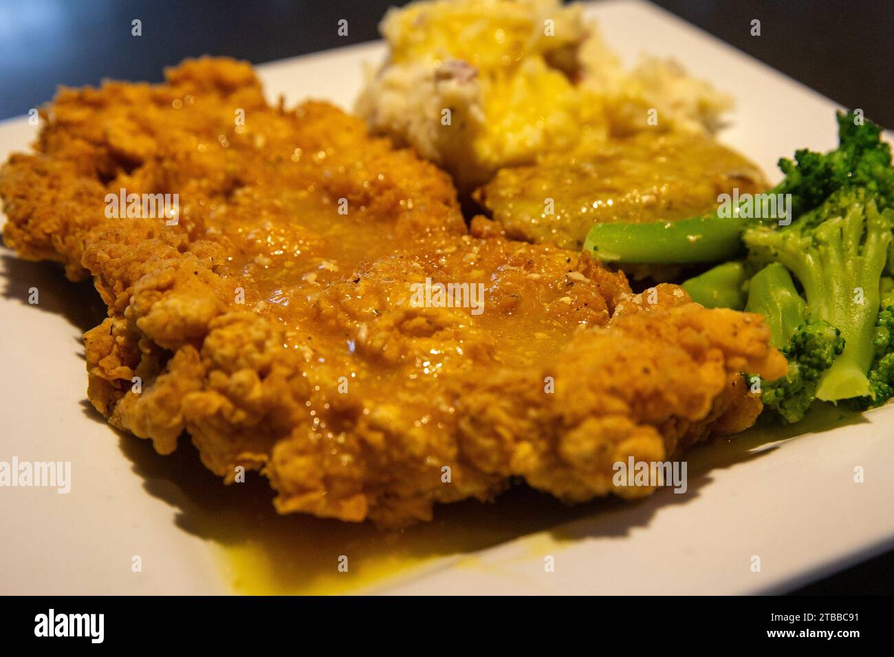 Country Fried Steak with sides Stock Photo - Alamy