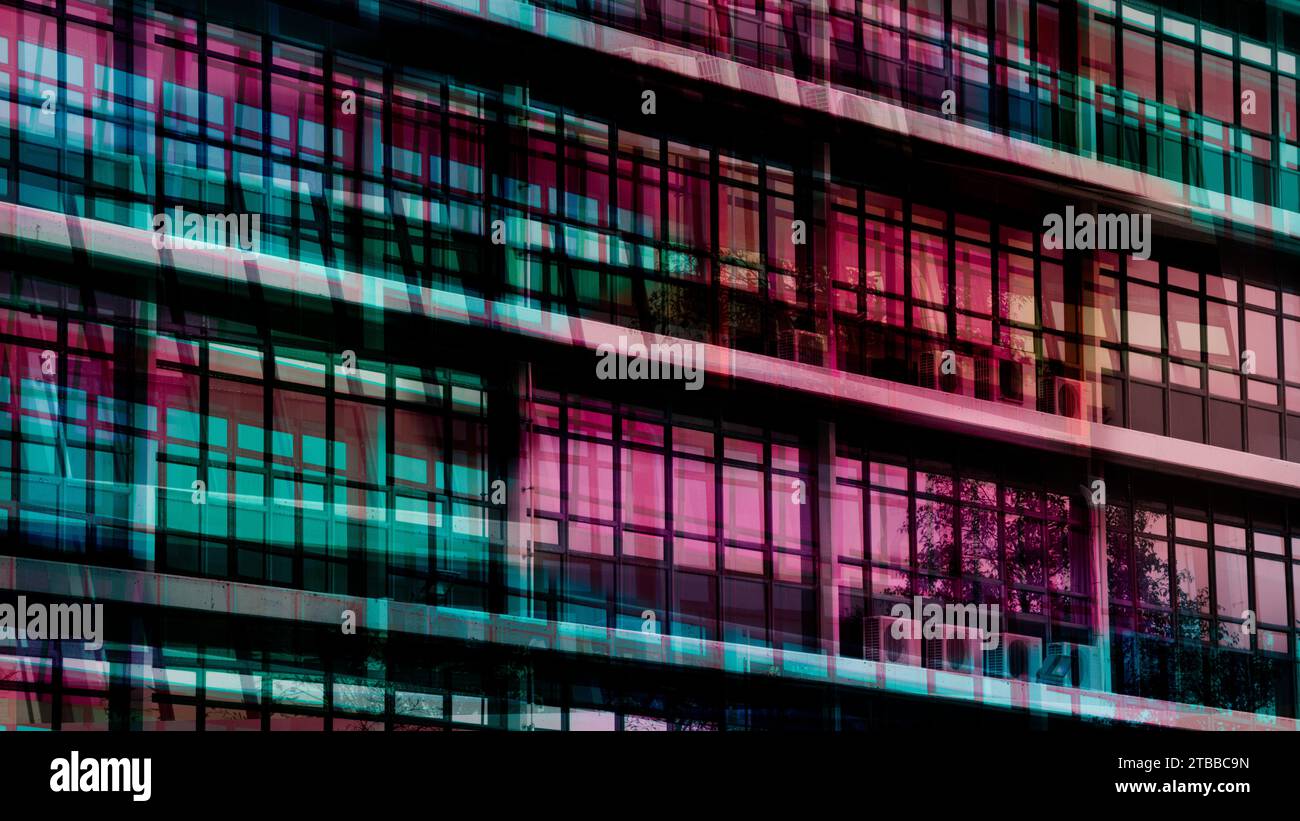 Artistic building facade of glass and concrete Stock Photo - Alamy