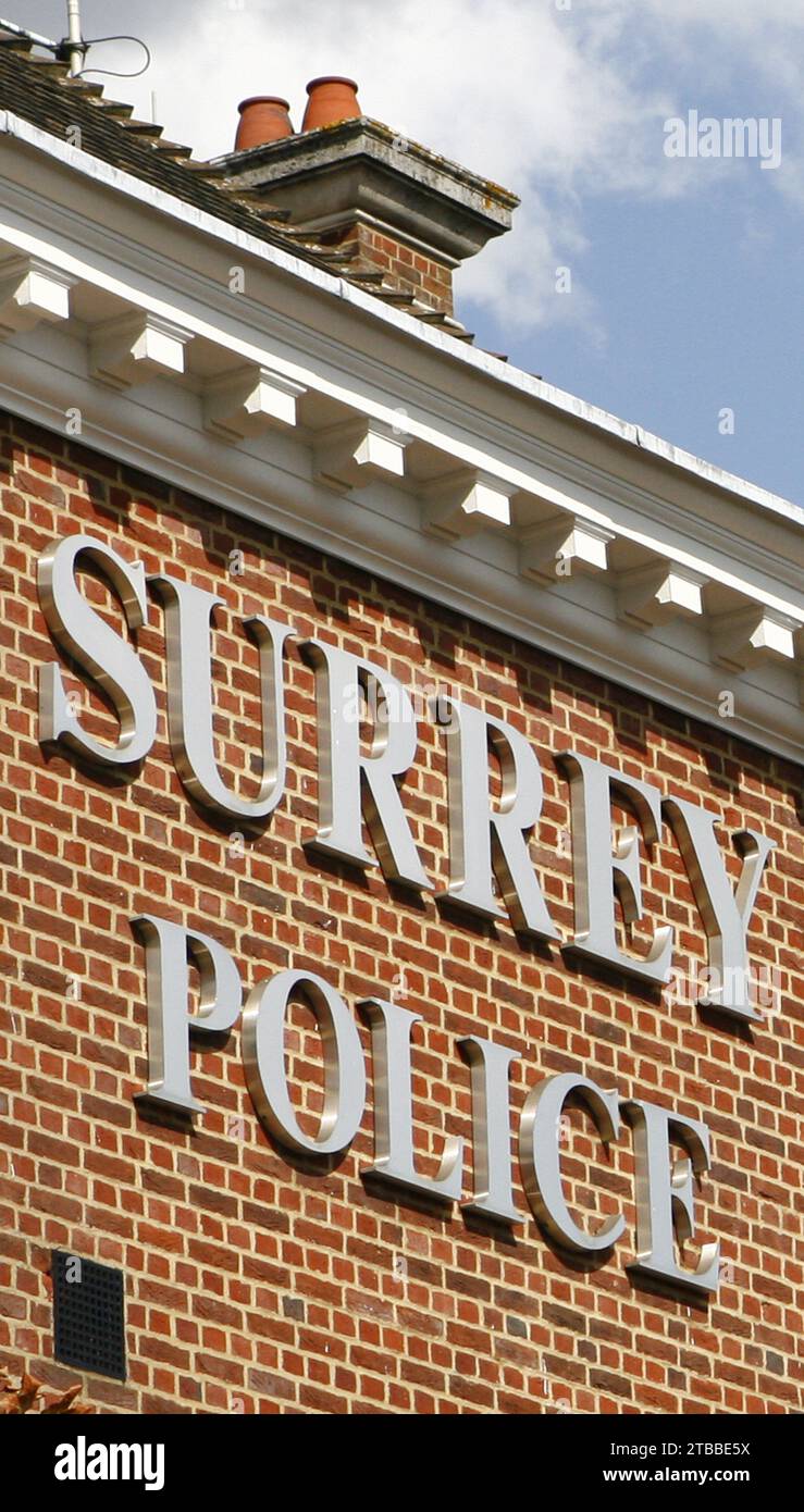 File photo dated 24/08/09 of Surrey Police in Woking, Surrey. Two ...