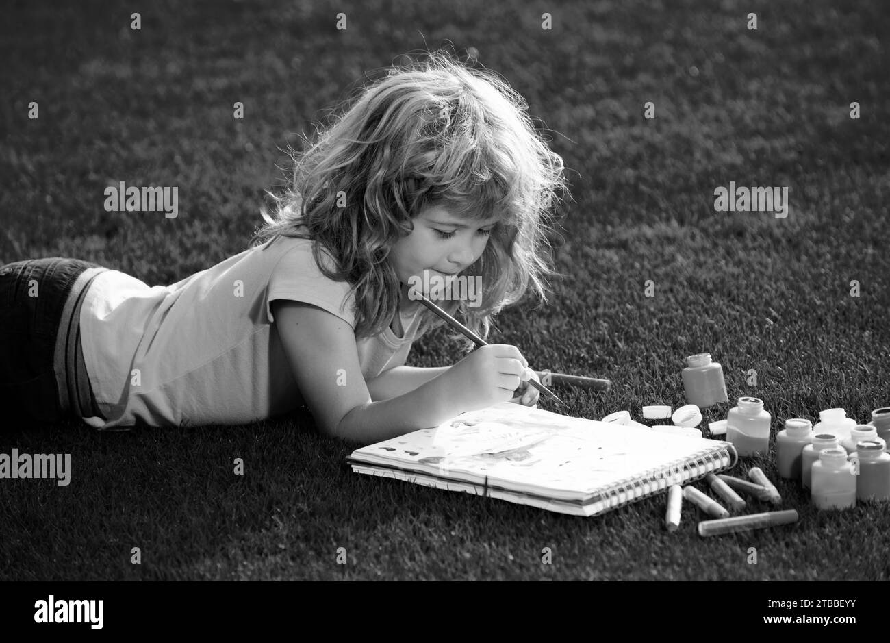 Child painting drawing art. Portrait of smiling happy kid enjoying art ...